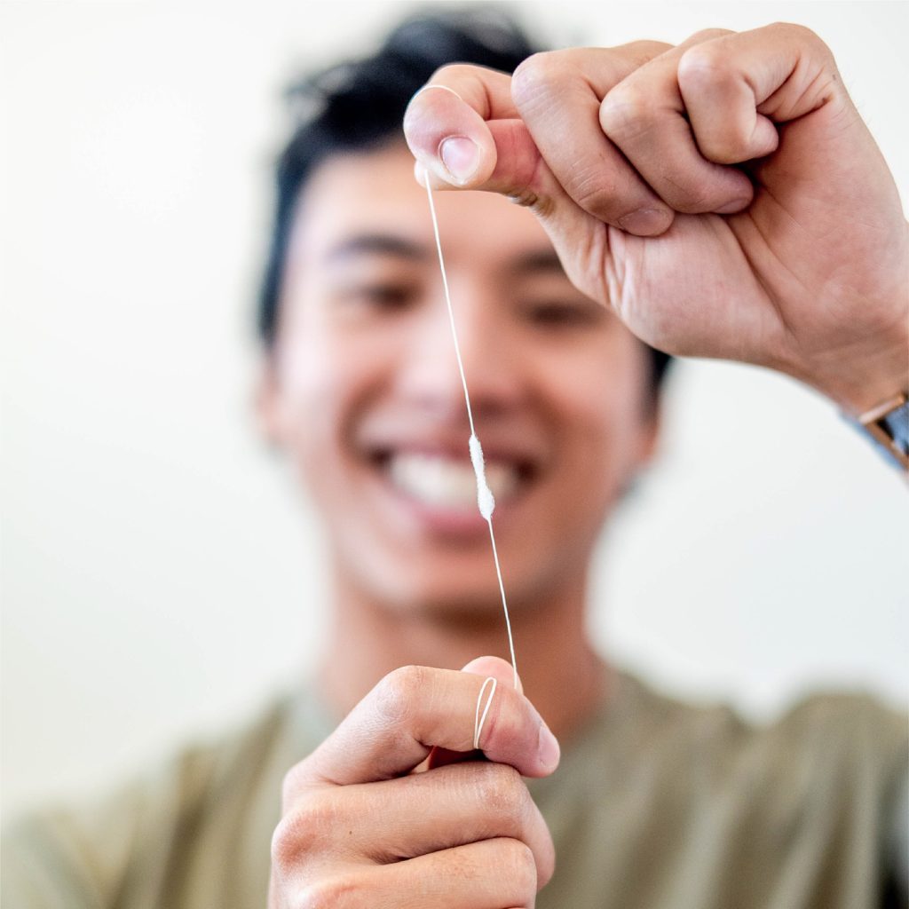 Expanding Dental Floss with Coconut Oil | Dr. Ginger’s